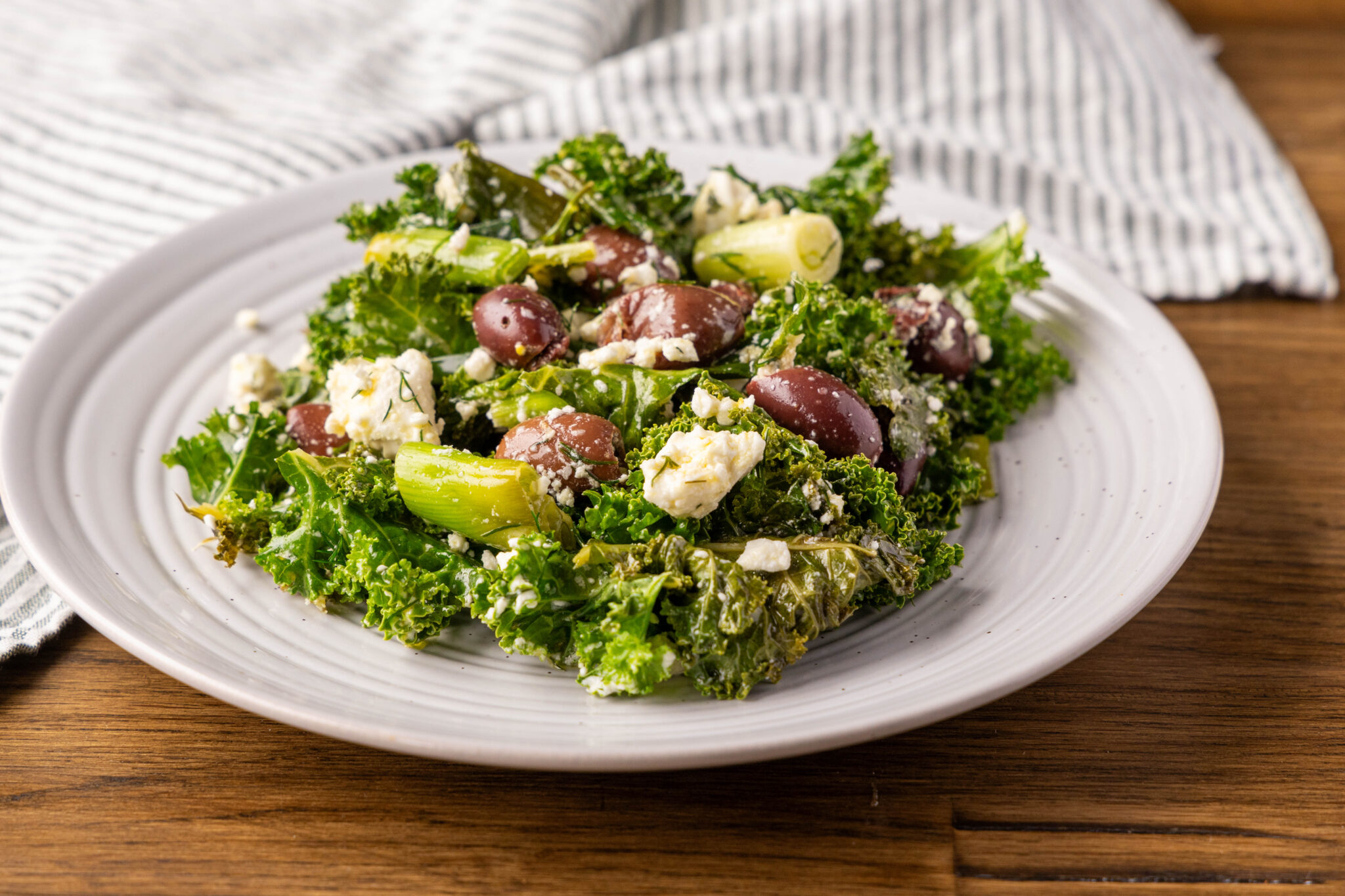 Campfire Foil-Packed Greens with Feta and Olives - Community Natural Foods
